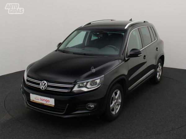 Black Volkswagen Tiguan 2014 in Vilnius, with an engine capacity of 1.40 L and mileage of 99 thousand km for 12399 €, photo 1 on AUTOMOTO.COM.LV