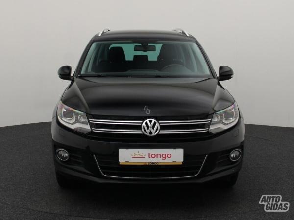Black Volkswagen Tiguan 2014 in Vilnius, with an engine capacity of 1.40 L and mileage of 99 thousand km for 12399 €, photo 3 on AUTOMOTO.COM.LV