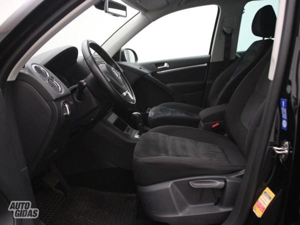 Black Volkswagen Tiguan 2014 in Vilnius, with an engine capacity of 1.40 L and mileage of 99 thousand km for 12399 €, photo 4 on AUTOMOTO.COM.LV