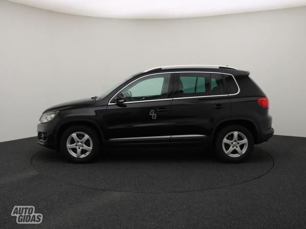 Black Volkswagen Tiguan 2014 in Vilnius, with an engine capacity of 1.40 L and mileage of 99 thousand km for 12399 €, photo 6 on AUTOMOTO.COM.LV