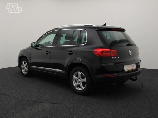 Black Volkswagen Tiguan 2014 in Vilnius, with an engine capacity of 1.40 L and mileage of 99 thousand km for 12399 €, photo 7 on AUTOMOTO.COM.LV