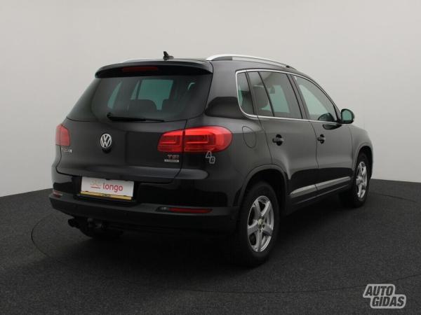 Black Volkswagen Tiguan 2014 in Vilnius, with an engine capacity of 1.40 L and mileage of 99 thousand km for 12399 €, photo 8 on AUTOMOTO.COM.LV