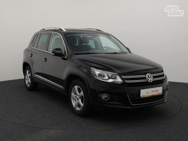 Black Volkswagen Tiguan 2014 in Vilnius, with an engine capacity of 1.40 L and mileage of 99 thousand km for 12399 €, photo 10 on AUTOMOTO.COM.LV