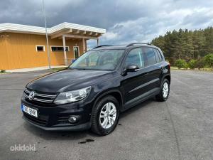 Black Volkswagen Tiguan 2014 in Narva, with an engine capacity of 1.40 L and mileage of 191 thousand km for 6500 €, photo  on AUTOMOTO.COM.LV