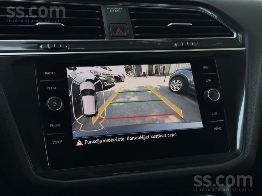Black Volkswagen Tiguan 2023 in Riga, with an engine capacity of 1.50 L and mileage of 76 thousand km for 28550 €, photo 14 on AUTOMOTO.COM.LV