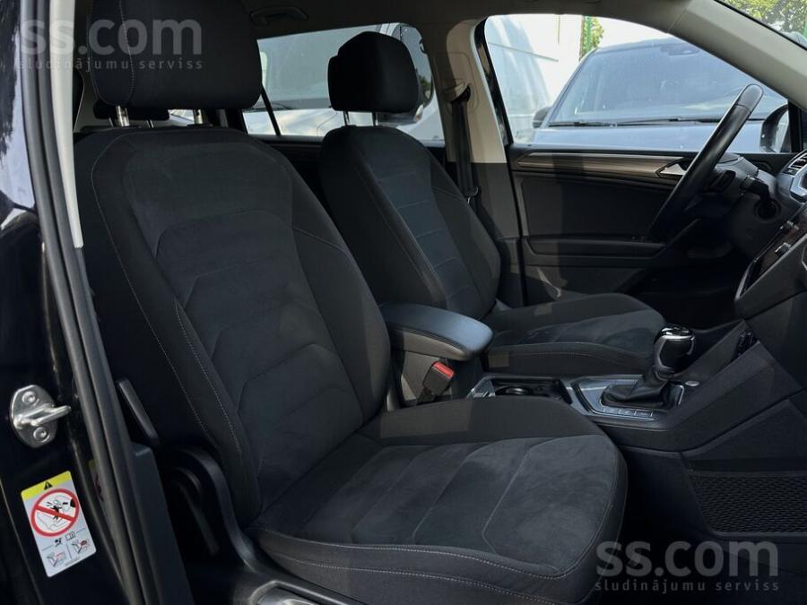Black Volkswagen Tiguan 2023 in Riga, with an engine capacity of 1.50 L and mileage of 76 thousand km for 28550 €, photo 19 on AUTOMOTO.COM.LV