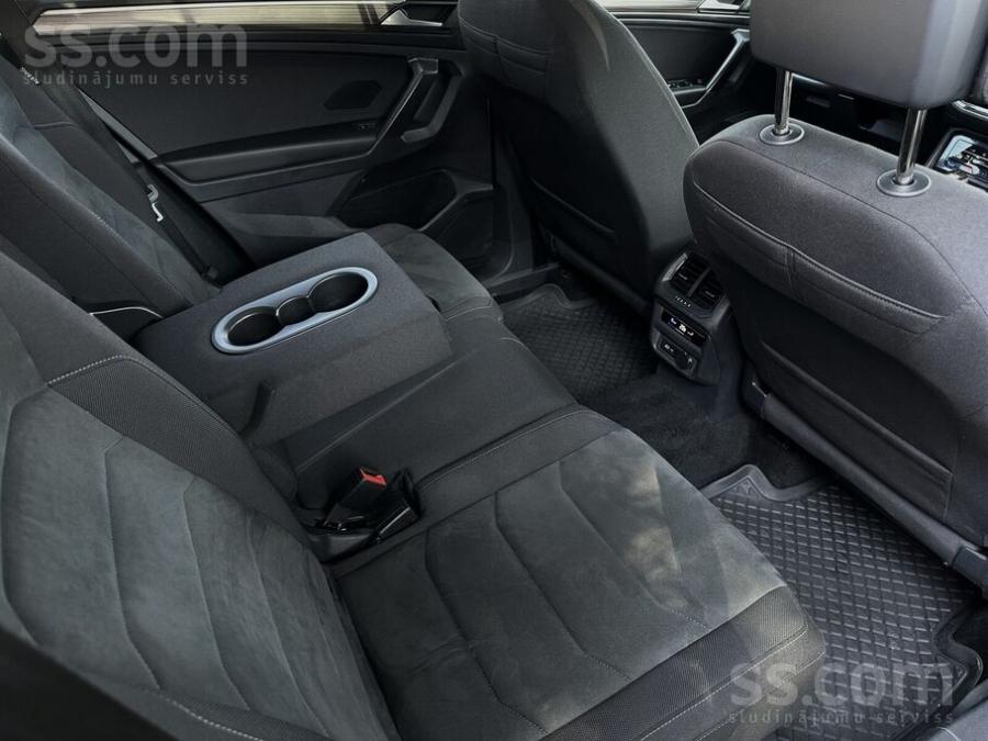 Black Volkswagen Tiguan 2023 in Riga, with an engine capacity of 1.50 L and mileage of 76 thousand km for 28550 €, photo 20 on AUTOMOTO.COM.LV