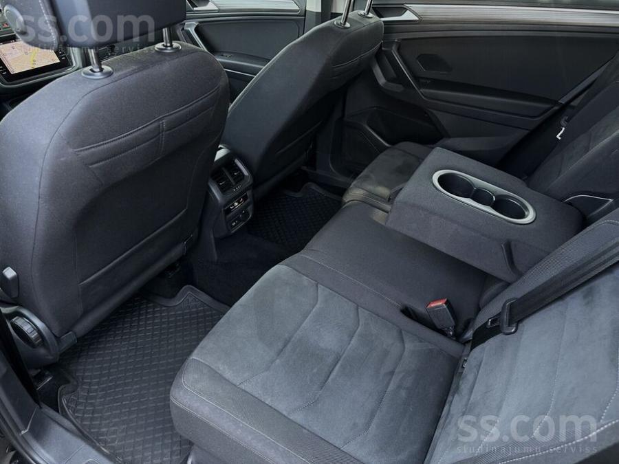 Black Volkswagen Tiguan 2023 in Riga, with an engine capacity of 1.50 L and mileage of 76 thousand km for 28550 €, photo 22 on AUTOMOTO.COM.LV