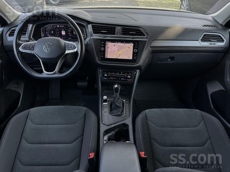 Black Volkswagen Tiguan 2023 in Riga, with an engine capacity of 1.50 L and mileage of 76 thousand km for 28550 €, photo 23 on AUTOMOTO.COM.LV