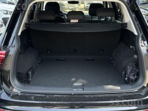 Black Volkswagen Tiguan 2023 in Riga, with an engine capacity of 1.50 L and mileage of 76 thousand km for 28550 €, photo 26 on AUTOMOTO.COM.LV