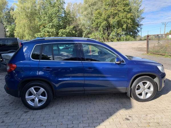 Zils Volkswagen Tiguan 2009 Rīga, ar dzinēja tilpumu 2.00 L un nobraukumu 311 tūkst. km par 4700 €, foto 5 vietnē AUTOMOTO.COM.LV