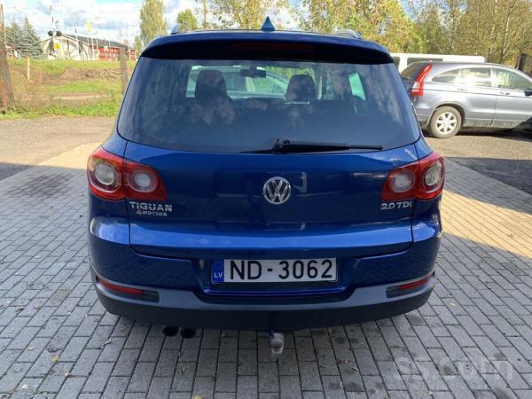 Zils Volkswagen Tiguan 2009 Rīga, ar dzinēja tilpumu 2.00 L un nobraukumu 311 tūkst. km par 4700 €, foto 7 vietnē AUTOMOTO.COM.LV