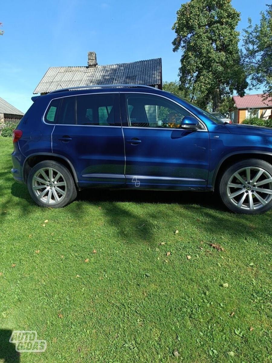Blue Volkswagen Tiguan 2010 in Kaunas, with an engine capacity of 2.00 L and mileage of 298 thousand km for 7000 €, photo 2 on AUTOMOTO.COM.LV