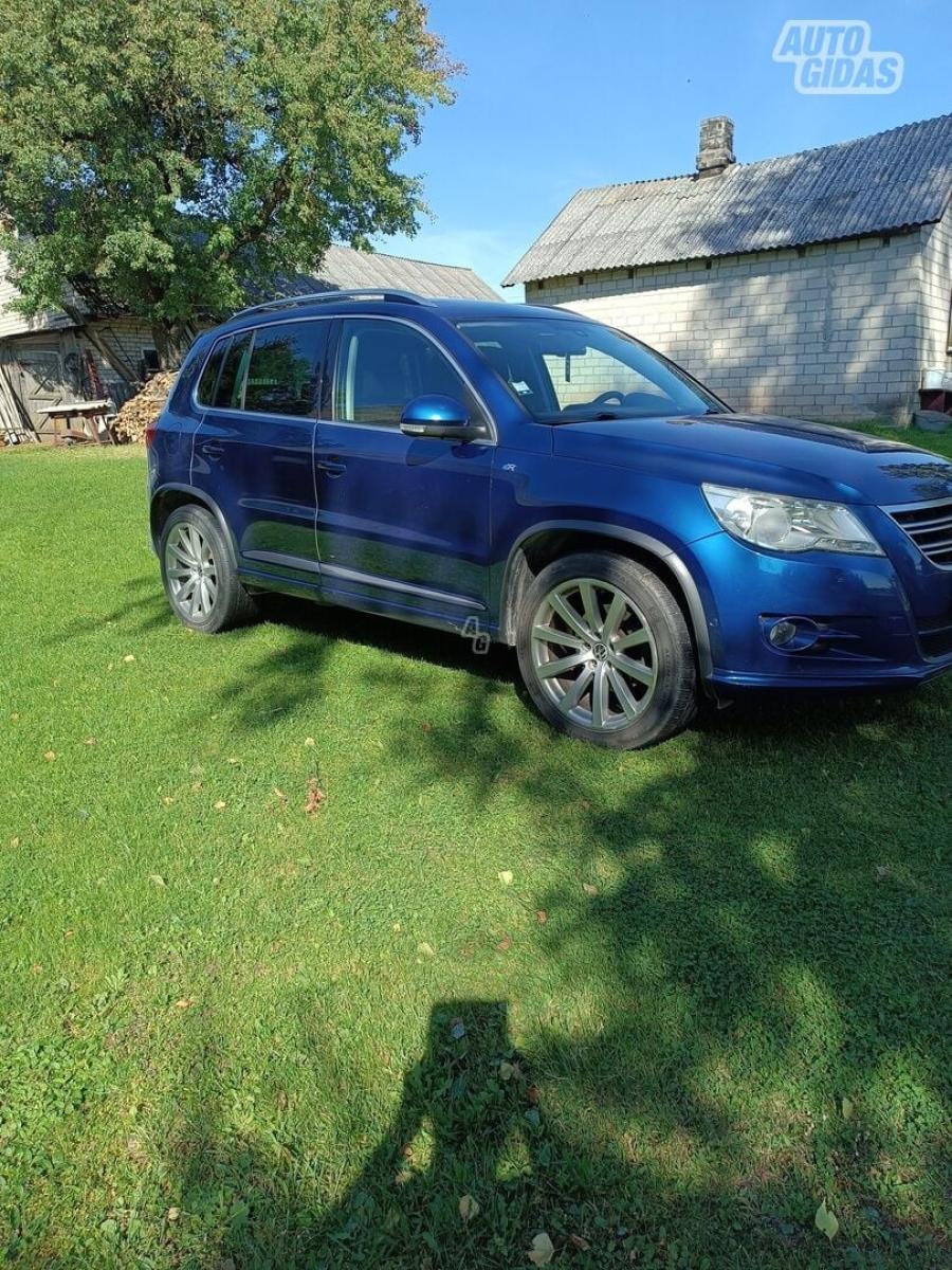 Blue Volkswagen Tiguan 2010 in Kaunas, with an engine capacity of 2.00 L and mileage of 298 thousand km for 7000 €, photo 3 on AUTOMOTO.COM.LV