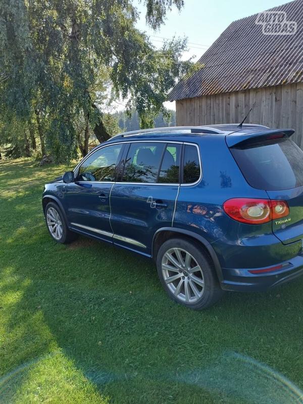 Blue Volkswagen Tiguan 2010 in Kaunas, with an engine capacity of 2.00 L and mileage of 298 thousand km for 7000 €, photo 5 on AUTOMOTO.COM.LV