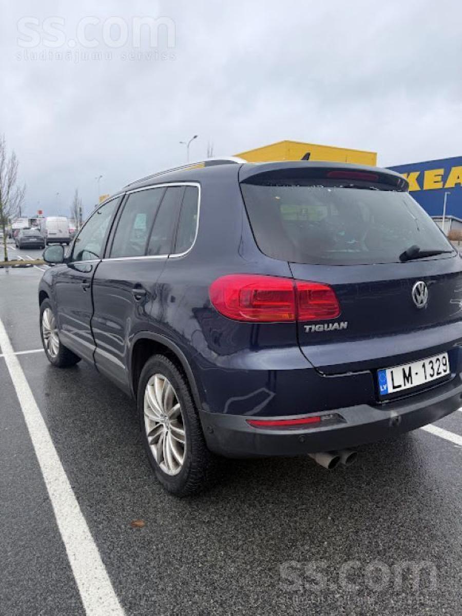 Zils Volkswagen Tiguan 2011 Rīga, ar dzinēja tilpumu 2.00 L un nobraukumu 273 tūkst. km par 10250 €, foto 4 vietnē AUTOMOTO.COM.LV