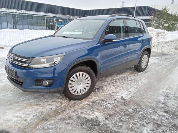Blue Volkswagen Tiguan 2011 in Kaunas, with an engine capacity of 1.39 L and mileage of 193 thousand km for 6900 €, photo 1 on AUTOMOTO.COM.LV
