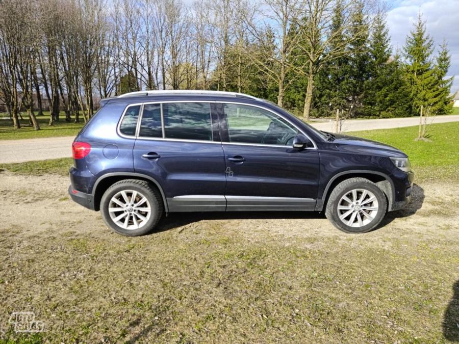 Zils Volkswagen Tiguan 2011 Ariogala, ar dzinēja tilpumu 2.00 L un nobraukumu 183 tūkst. km par 9400 €, foto 4 vietnē AUTOMOTO.COM.LV