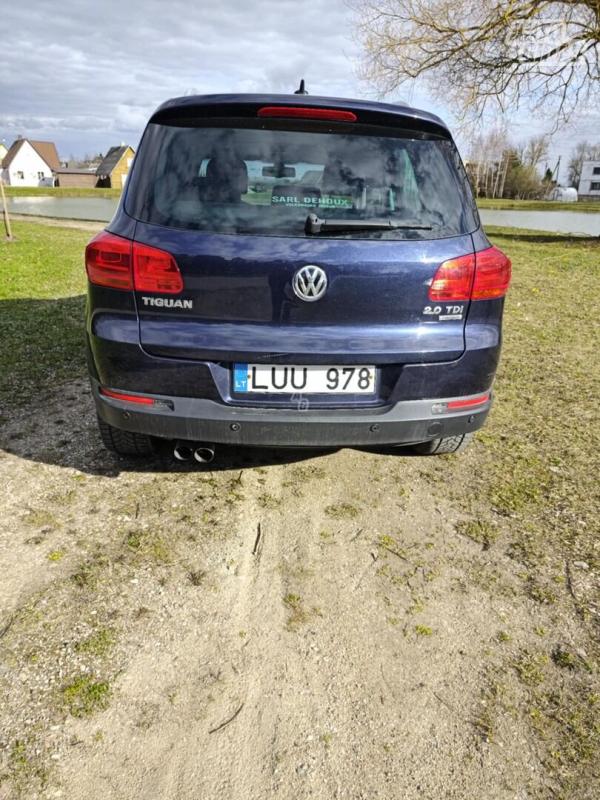 Blue Volkswagen Tiguan 2011 in Ariogala, with an engine capacity of 2.00 L and mileage of 183 thousand km for 9400 €, photo 7 on AUTOMOTO.COM.LV