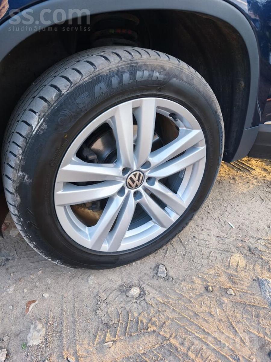 Blue Volkswagen Tiguan 2013 in Riga, with an engine capacity of 2.00 L and mileage of 155 thousand km for 10200 €, photo 17 on AUTOMOTO.COM.LV