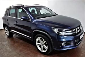 Blue Volkswagen Tiguan 2014 in Riga, with an engine capacity of 2.00 L and mileage of 180 thousand km for 11700 €, photo  on AUTOMOTO.COM.LV