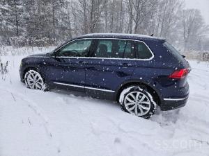 Blue Volkswagen Tiguan 2016 in Rezekne, with an engine capacity of 2.00 L and mileage of 156 thousand km for 17800 €, photo 2 on AUTOMOTO.COM.LV