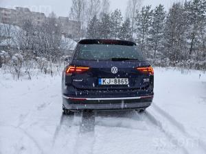 Blue Volkswagen Tiguan 2016 in Rezekne, with an engine capacity of 2.00 L and mileage of 156 thousand km for 17800 €, photo 3 on AUTOMOTO.COM.LV