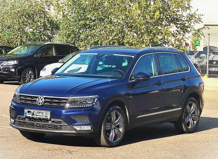 Blue Volkswagen Tiguan 2016 in Vilnius, with an engine capacity of 2.00 L and mileage of 134 thousand km for 17545 €, photo 4 on AUTOMOTO.COM.LV