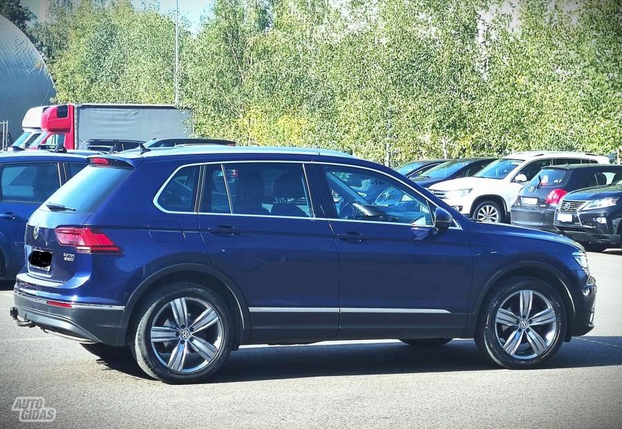 Blue Volkswagen Tiguan 2016 in Vilnius, with an engine capacity of 2.00 L and mileage of 134 thousand km for 17545 €, photo 6 on AUTOMOTO.COM.LV