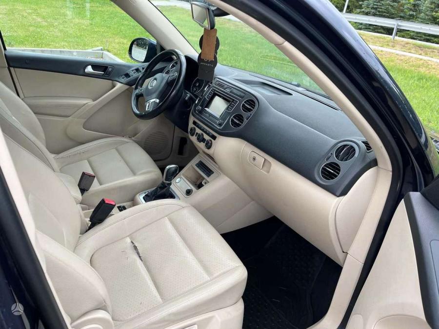 Blue Volkswagen Tiguan 2016 in Gargzdai, with an engine capacity of 1.98 L and mileage of 160 thousand km for 9450 €, photo 9 on AUTOMOTO.COM.LV