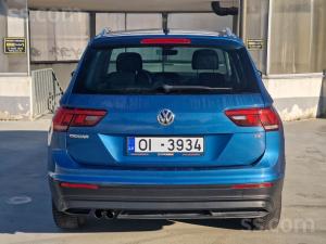Blue Volkswagen Tiguan 2016 in Riga, with an engine capacity of 1.40 L and mileage of 170 thousand km for 13350 €, photo  on AUTOMOTO.COM.LV