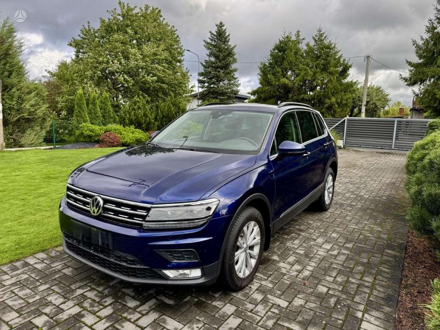 Blue Volkswagen Tiguan 2016 in Kaunas, with an engine capacity of 1.97 L and mileage of 280 thousand km for 12890 €, photo 1 on AUTOMOTO.COM.LV
