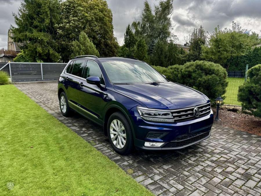 Blue Volkswagen Tiguan 2016 in Kaunas, with an engine capacity of 1.97 L and mileage of 280 thousand km for 12890 €, photo 3 on AUTOMOTO.COM.LV