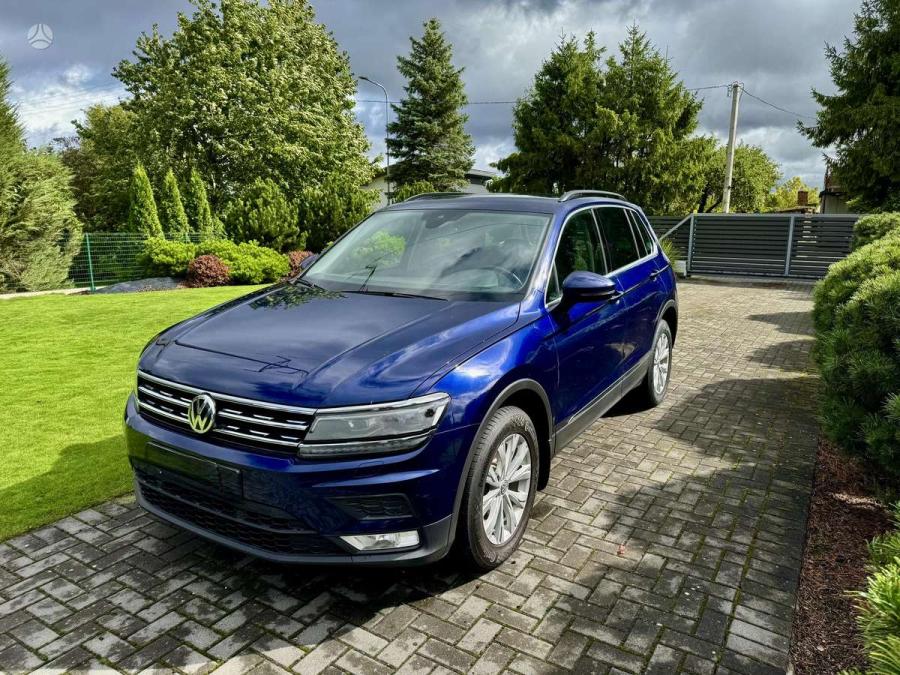Blue Volkswagen Tiguan 2016 in Kaunas, with an engine capacity of 1.97 L and mileage of 280 thousand km for 12890 €, photo 6 on AUTOMOTO.COM.LV