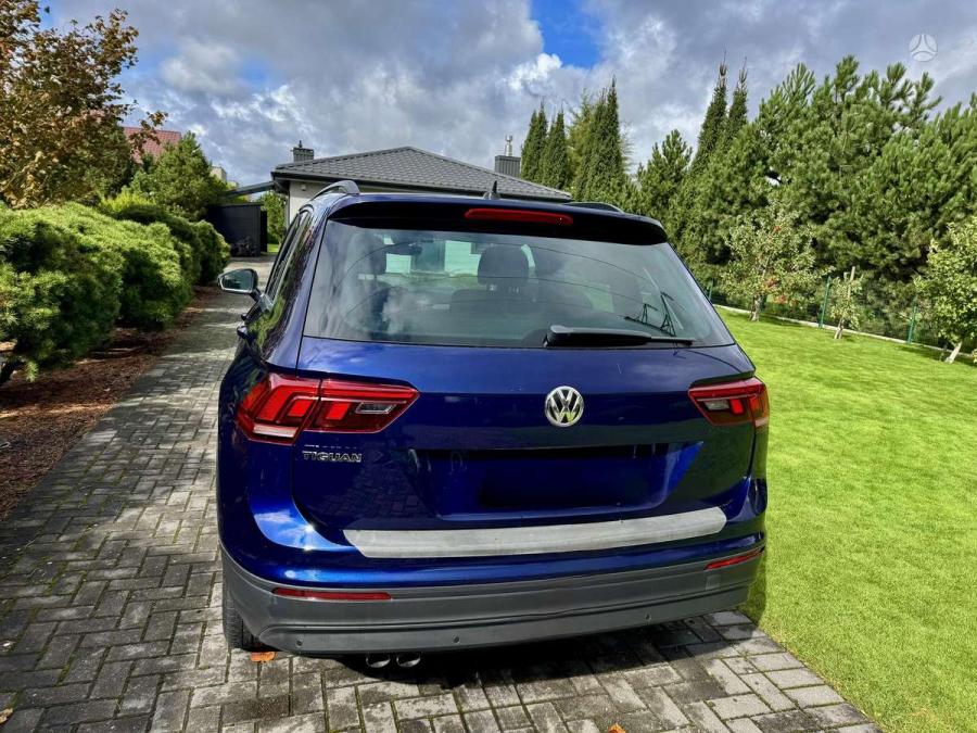 Blue Volkswagen Tiguan 2016 in Kaunas, with an engine capacity of 1.97 L and mileage of 280 thousand km for 12890 €, photo 8 on AUTOMOTO.COM.LV