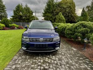 Blue Volkswagen Tiguan 2016 in Kaunas, with an engine capacity of 1.97 L and mileage of 280 thousand km for 12890 €, photo 9 on AUTOMOTO.COM.LV