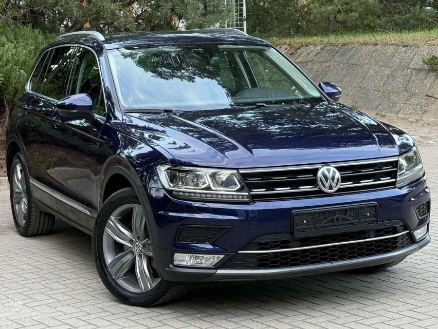 Blue Volkswagen Tiguan 2016 in Prienai, with an engine capacity of 1.97 L and mileage of 197 thousand km for 13950 €, photo 1 on AUTOMOTO.COM.LV