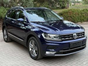 Blue Volkswagen Tiguan 2016 in Prienai, with an engine capacity of 1.97 L and mileage of 197 thousand km for 13950 €, photo 3 on AUTOMOTO.COM.LV