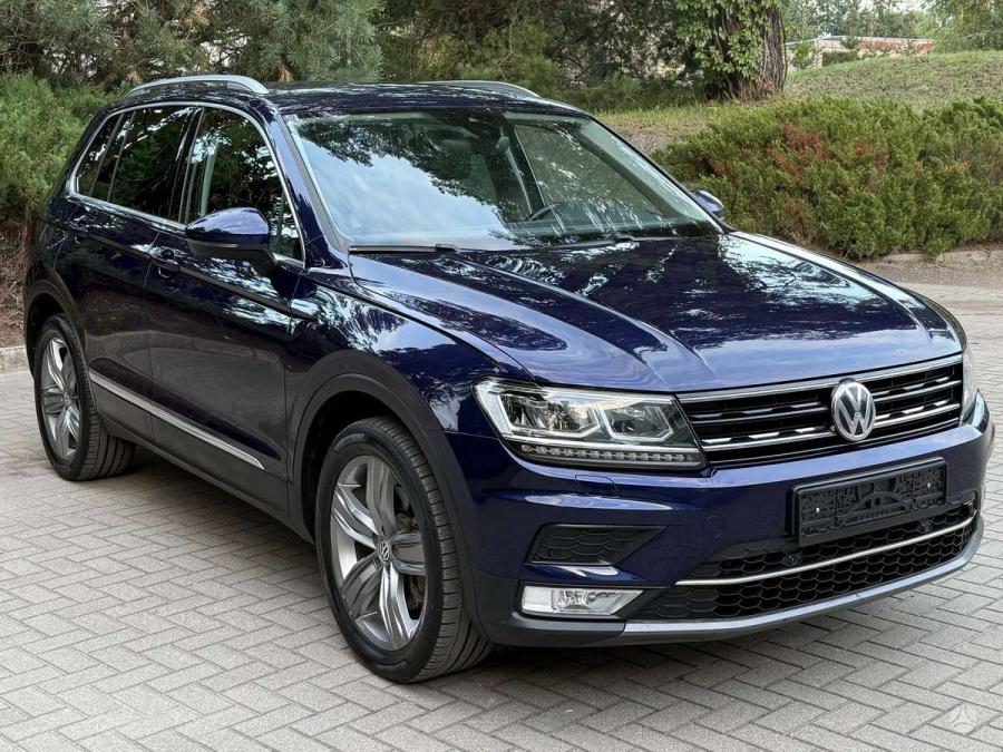 Blue Volkswagen Tiguan 2016 in Prienai, with an engine capacity of 1.97 L and mileage of 197 thousand km for 13950 €, photo 3 on AUTOMOTO.COM.LV