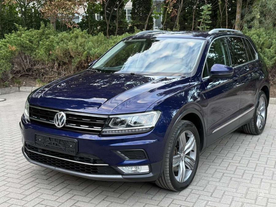 Blue Volkswagen Tiguan 2016 in Prienai, with an engine capacity of 1.97 L and mileage of 197 thousand km for 13950 €, photo 4 on AUTOMOTO.COM.LV