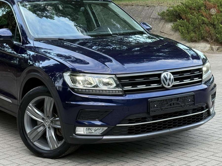 Blue Volkswagen Tiguan 2016 in Prienai, with an engine capacity of 1.97 L and mileage of 197 thousand km for 13950 €, photo 7 on AUTOMOTO.COM.LV