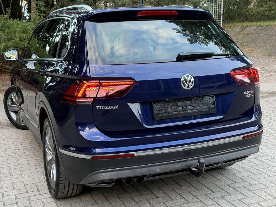 Blue Volkswagen Tiguan 2016 in Prienai, with an engine capacity of 1.97 L and mileage of 197 thousand km for 13950 €, photo 14 on AUTOMOTO.COM.LV
