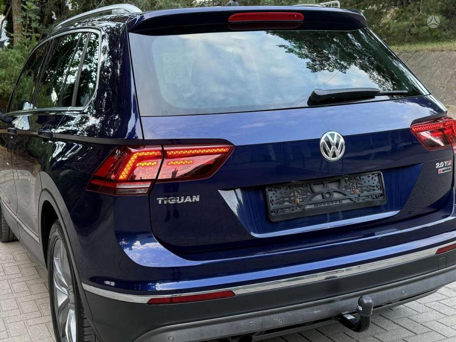 Blue Volkswagen Tiguan 2016 in Prienai, with an engine capacity of 1.97 L and mileage of 197 thousand km for 13950 €, photo 18 on AUTOMOTO.COM.LV