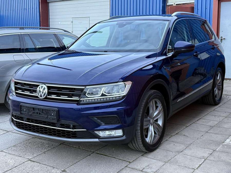 Blue Volkswagen Tiguan 2016 in Prienai, with an engine capacity of 1.97 L and mileage of 197 thousand km for 13950 €, photo 20 on AUTOMOTO.COM.LV
