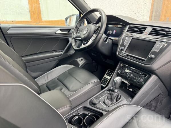 Blue Volkswagen Tiguan 2017 in Riga, with an engine capacity of 2.00 L and mileage of 227 thousand km for 18500 €, photo 6 on AUTOMOTO.COM.LV