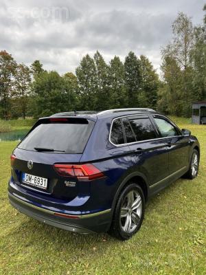 Zils Volkswagen Tiguan 2017 Liepāja, ar dzinēja tilpumu 2.00 L un nobraukumu 260 tūkst. km par 12995 €, foto 5 vietnē AUTOMOTO.COM.LV