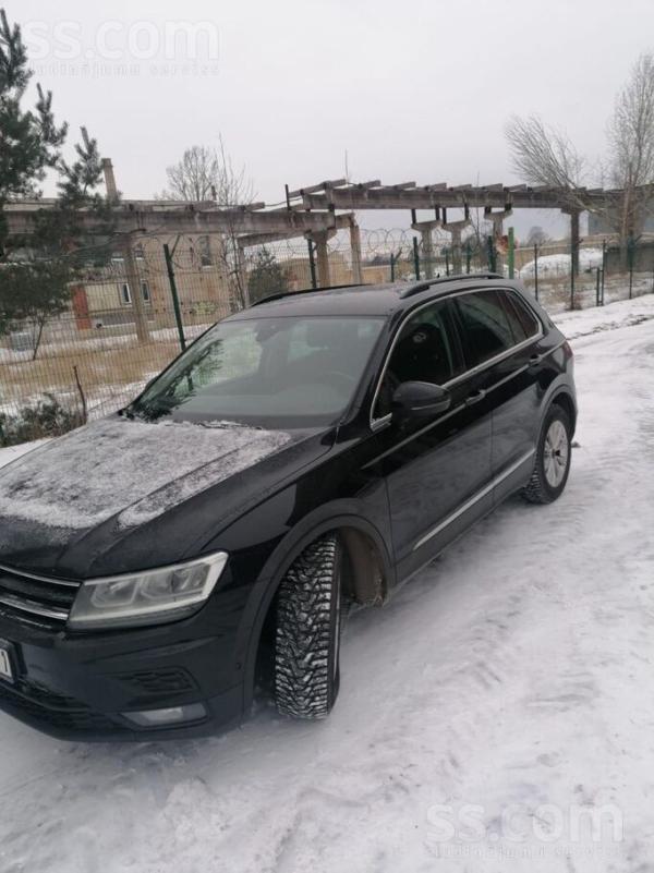 Blue Volkswagen Tiguan 2018 in Riga, with an engine capacity of 2.00 L and mileage of 330 thousand km for 12990 €, photo 4 on AUTOMOTO.COM.LV