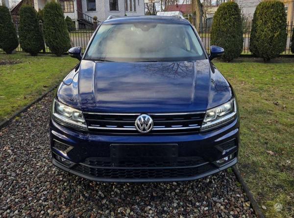 Blue Volkswagen Tiguan 2019 in Jurbarkas, with an engine capacity of 1.97 L and mileage of 209 thousand km for 17000 €, photo 1 on AUTOMOTO.COM.LV