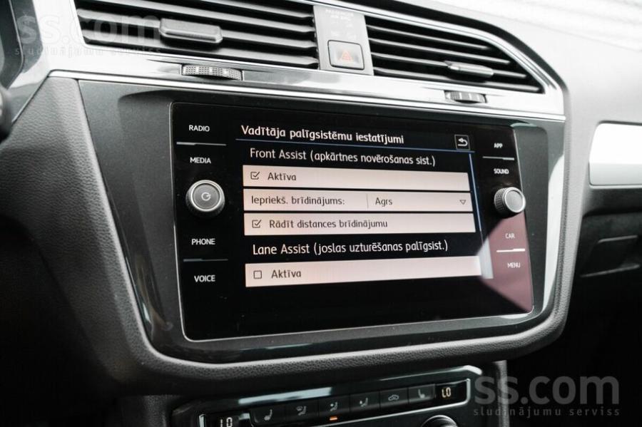 Blue Volkswagen Tiguan 2019 in Riga, with an engine capacity of 2.00 L and mileage of 123 thousand km for 17850 €, photo 14 on AUTOMOTO.COM.LV