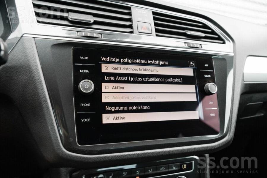 Blue Volkswagen Tiguan 2019 in Riga, with an engine capacity of 2.00 L and mileage of 123 thousand km for 17850 €, photo 15 on AUTOMOTO.COM.LV